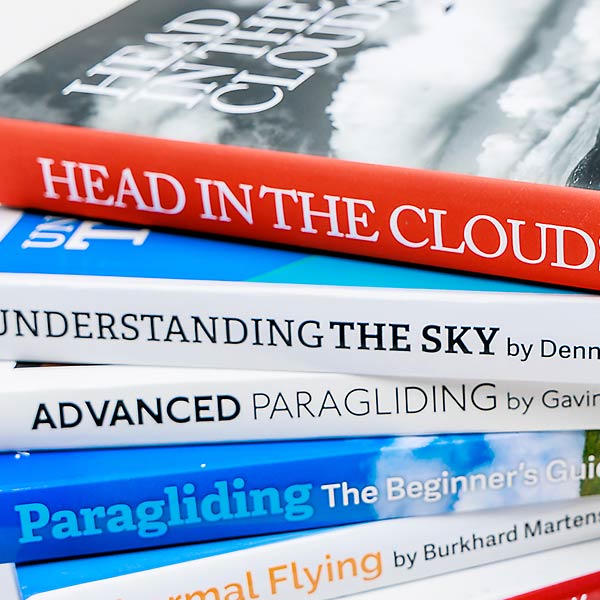 Books Stack Slide | Cross Country Magazine